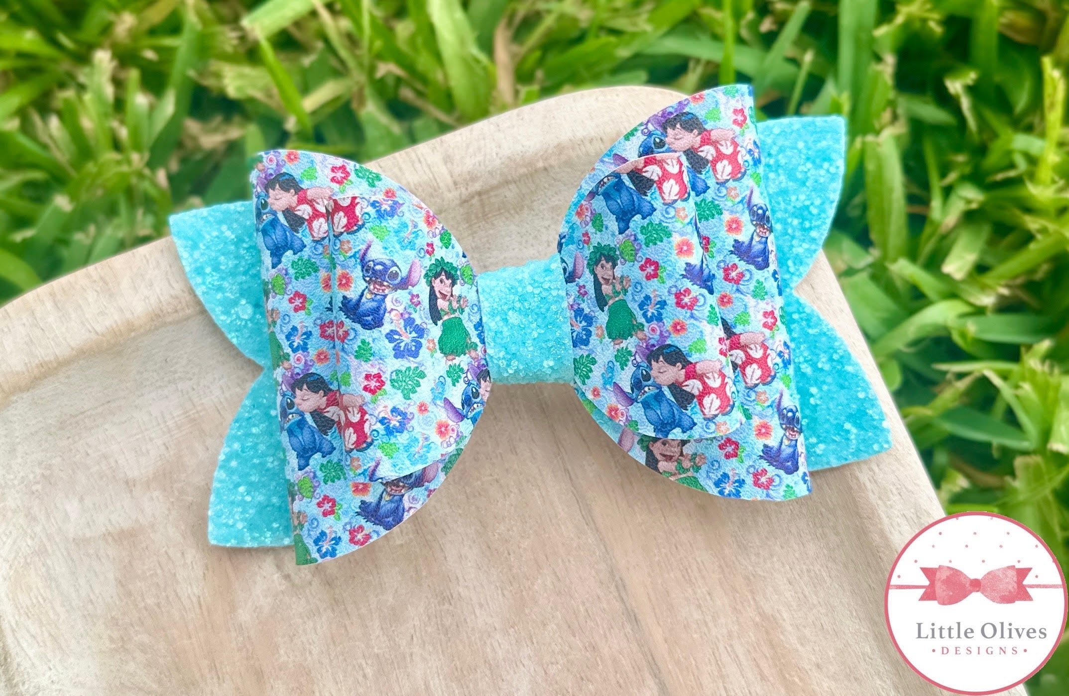 BLUE ALIEN HULA BOW – Little Olives Designs, LLC